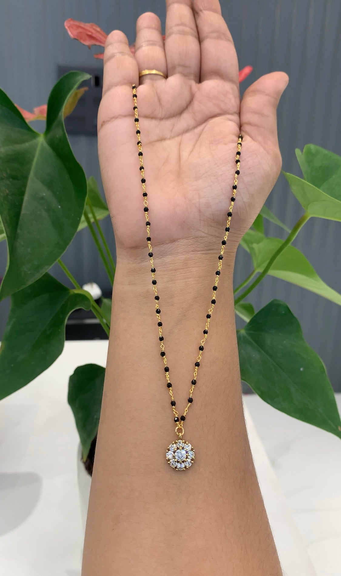 Cute locket with Black beads – Sujatha Gold Covering Works